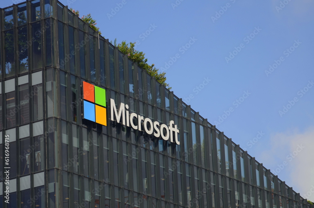 Microsoft sign on the office building. Logo Microsoft research and ...