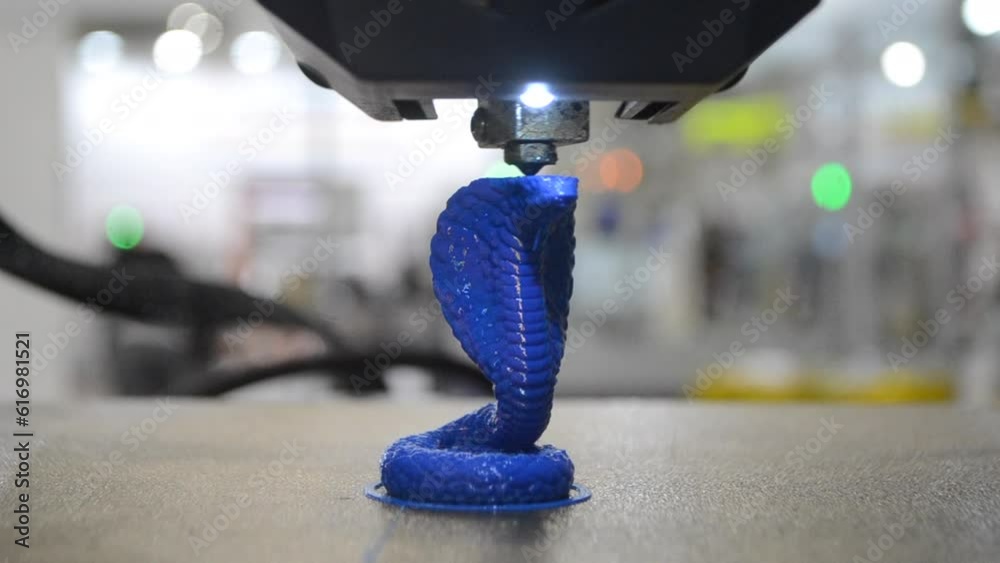 3D printer printing object close-up. Process creating three-dimensional model on 3d printer ...