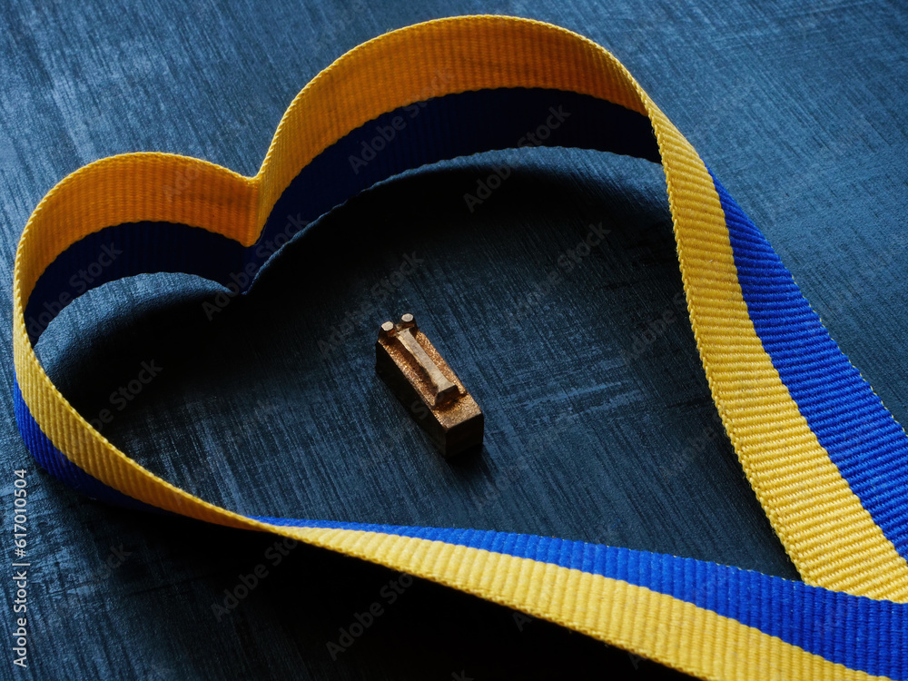 Learn Ukrainian concept. Ribbon with the colors of the flag of Ukraine ...