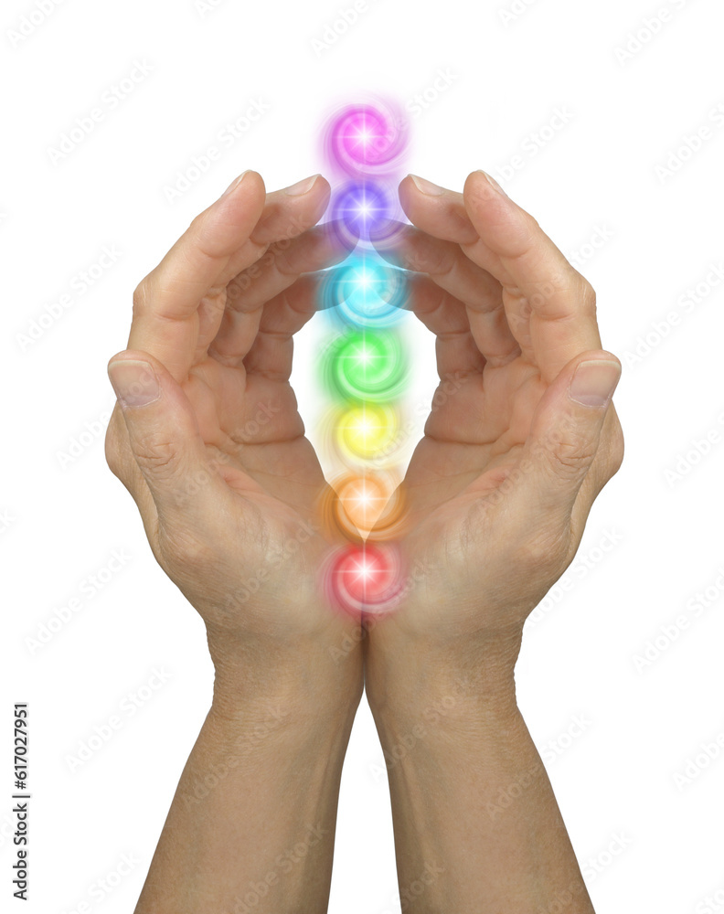 Female Reiki Healer hands palm sides facing inwards with seven rainbow ...