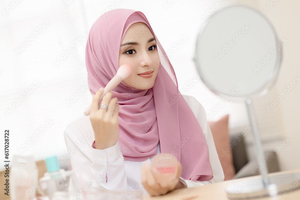 ํัYoung asian beautiful muslim woman with hijab looking mirror applying ...
