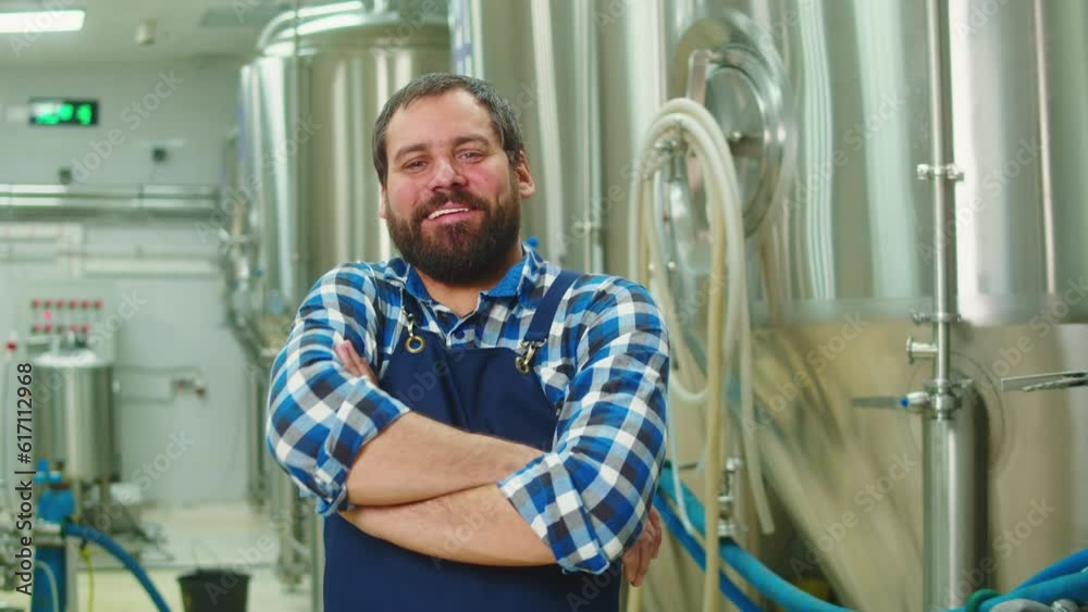 Craft beer production factory, brewery manufacture. Man trying beer in ...