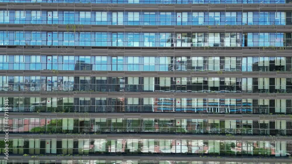 Bottom view of office building window close up, reflection and ...