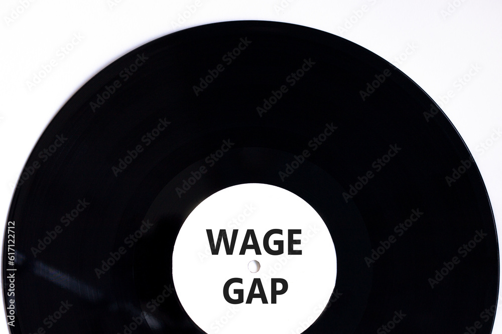Wage gap symbol. Concept words Wage gap on beautiful black vinyl disk ...