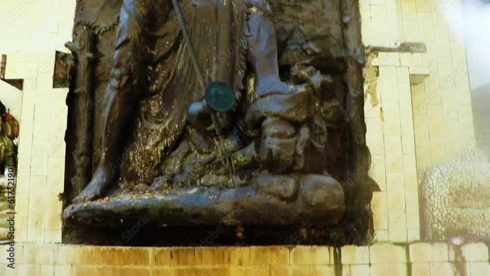 ancient shiva statue with natural holy hot spring water at day from ...