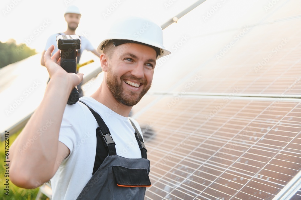 Engineering team working on checking and maintenance in solar power ...