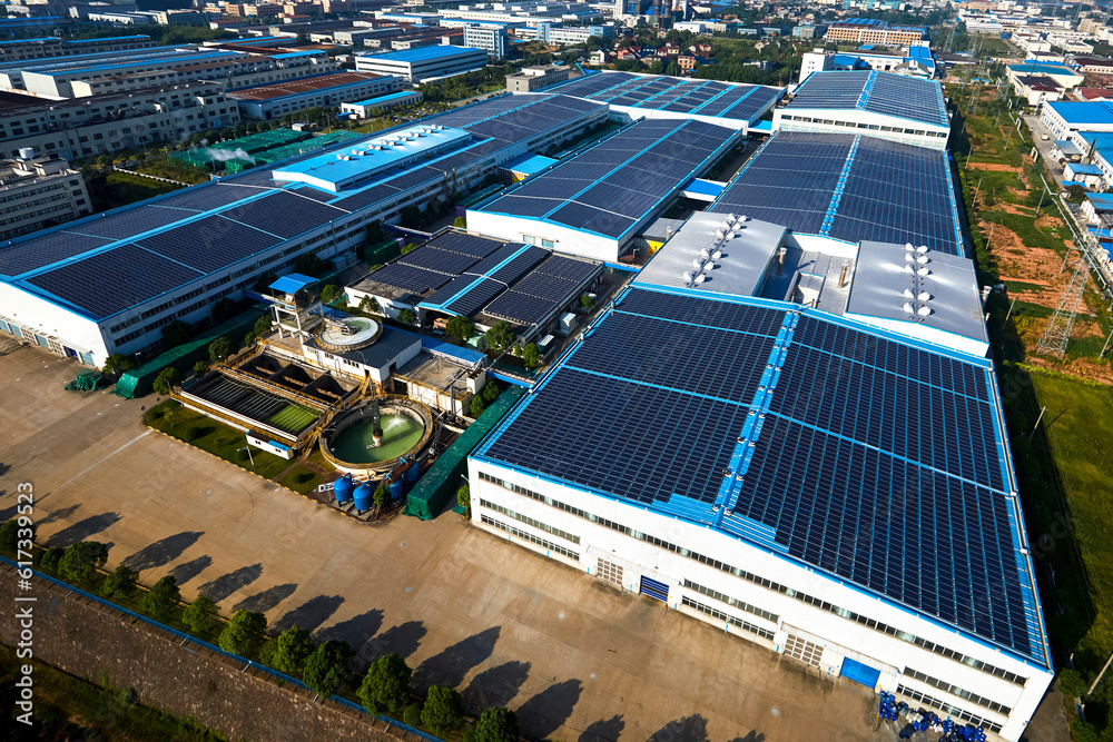 Aerial photography of solar photovoltaic panels built on the roof of a ...