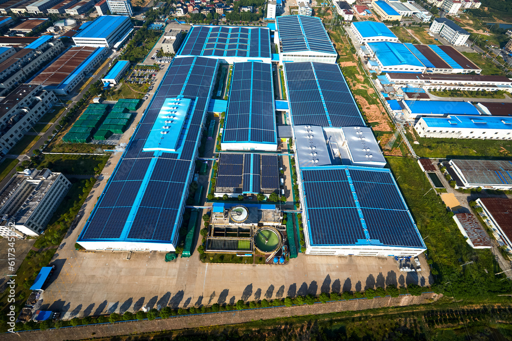 Aerial photography of solar photovoltaic panels built on the roof of a ...