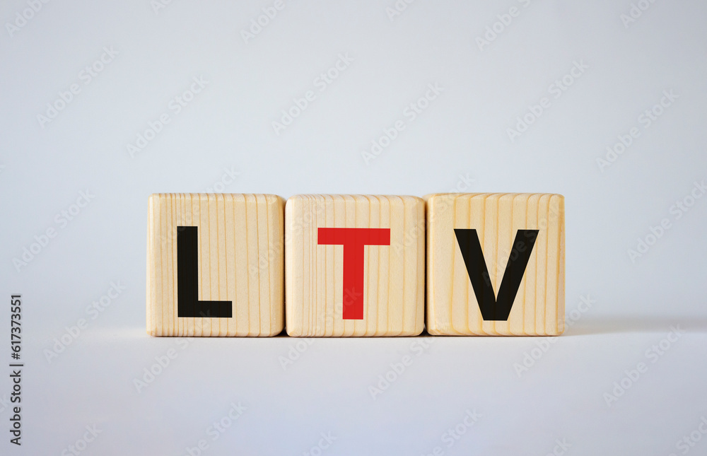 LTV - Life Time Value symbol. Concept word LTV on wooden cubes. Beautiful white background ...