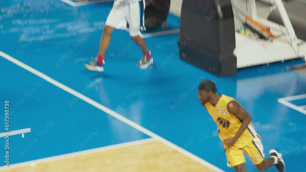 Basketball Championship Action on Live TV: Tracking Shot of a Team ...