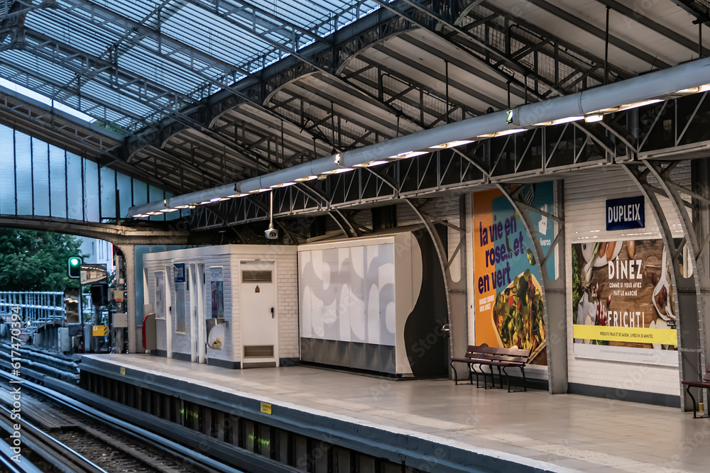 Interior of Dupleix station on line 6 of the Paris Metro. The track and ...