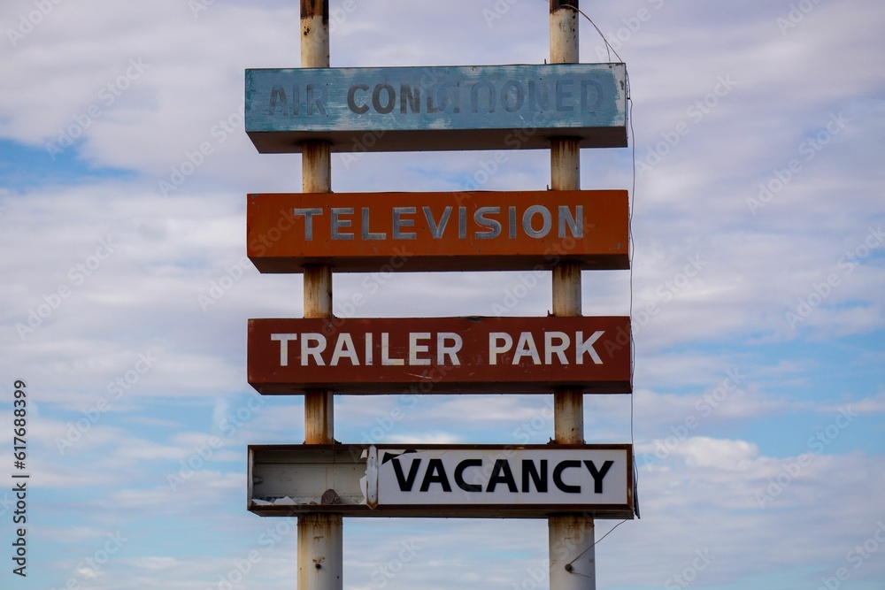 Fading, decrepit old trailer park sign for a long-gone trailer park in ...