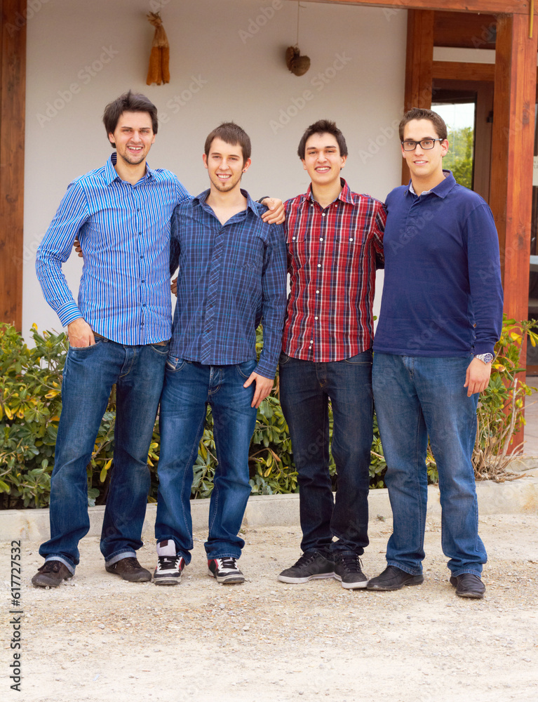 Group, causal and portrait of male friends together standing in an ...