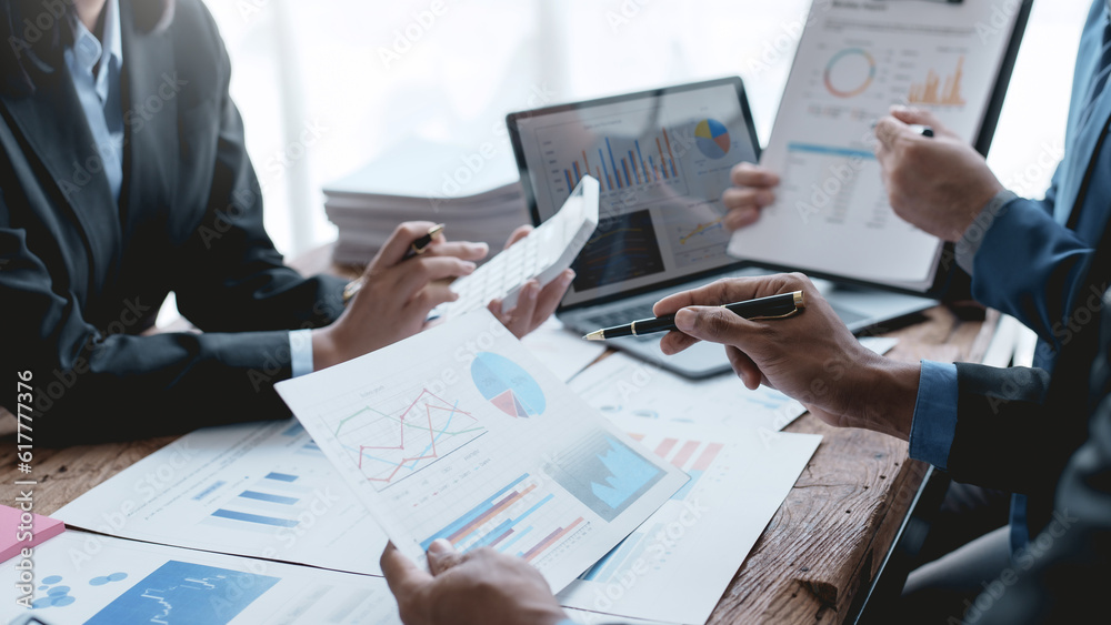 Successful Business Team Meeting Pointing at Graph for Strategic ...