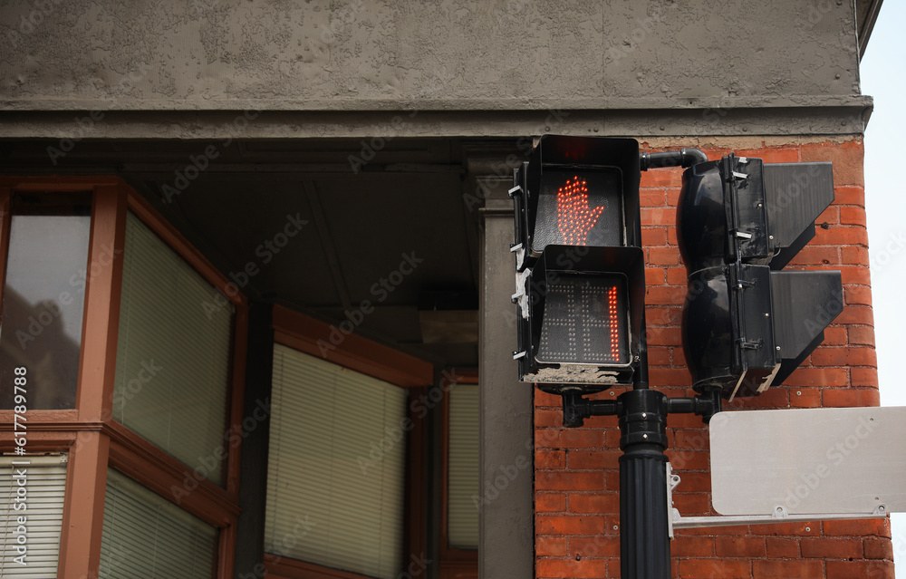 street light with traffic signals, displaying the colors red, green ...