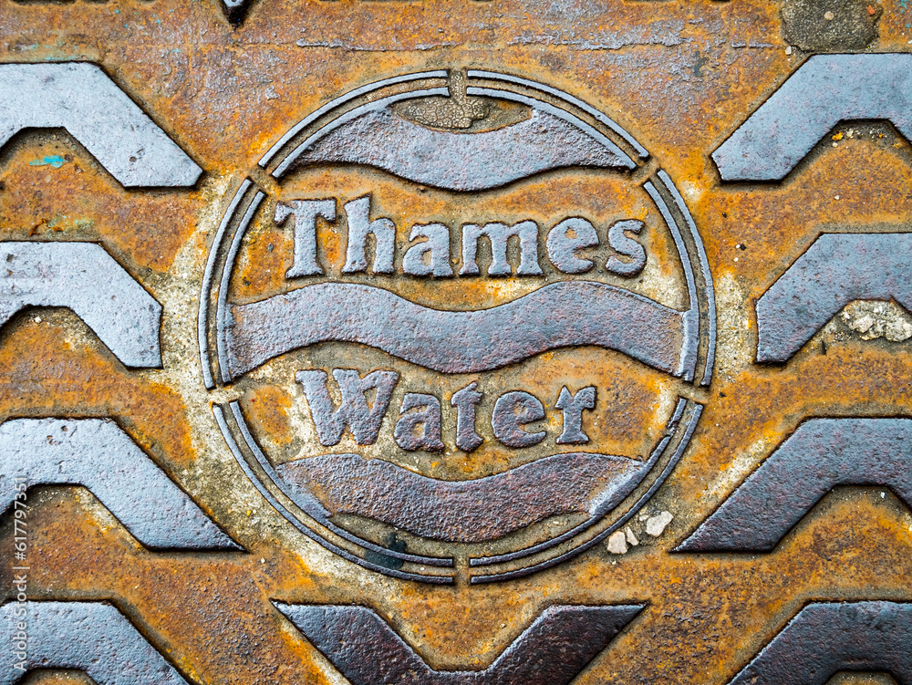 Foto de London, UK, June 28th 2023:A close up of a Thames water manhole ...