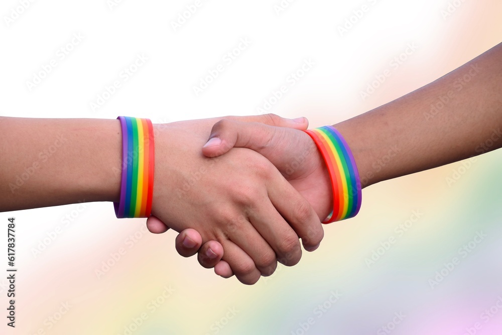 Hands which had rainbow wristbands around, LGBT symbol, concept for ...