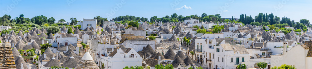 Trullo buildings in Alberobello "beautiful tree"; The Famous town of ...