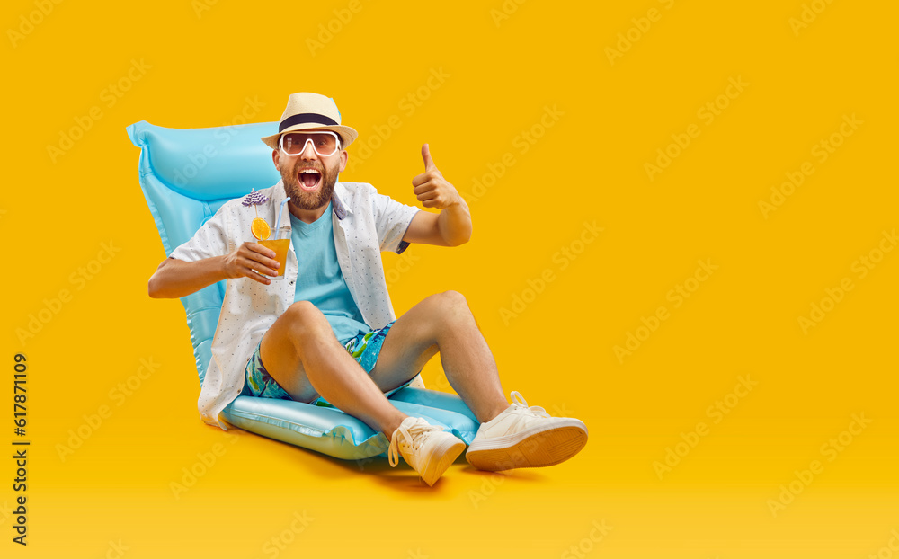 Happy adult man in holiday shirt, shorts, sunhat, sunglasses enjoying ...