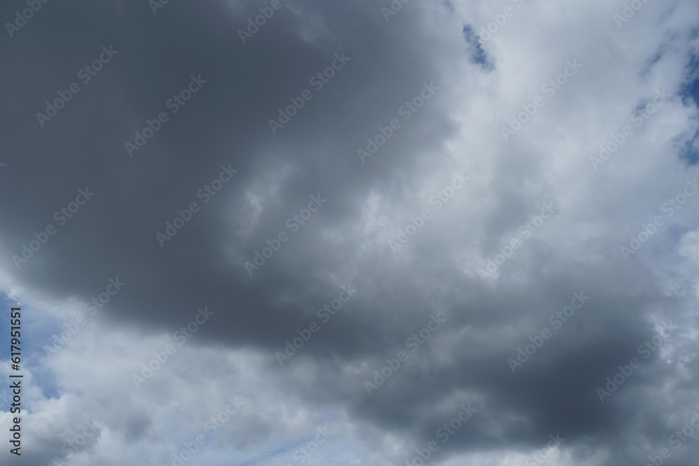 A terrible black cloud hangs in the sky before the rain. Bad weather ...