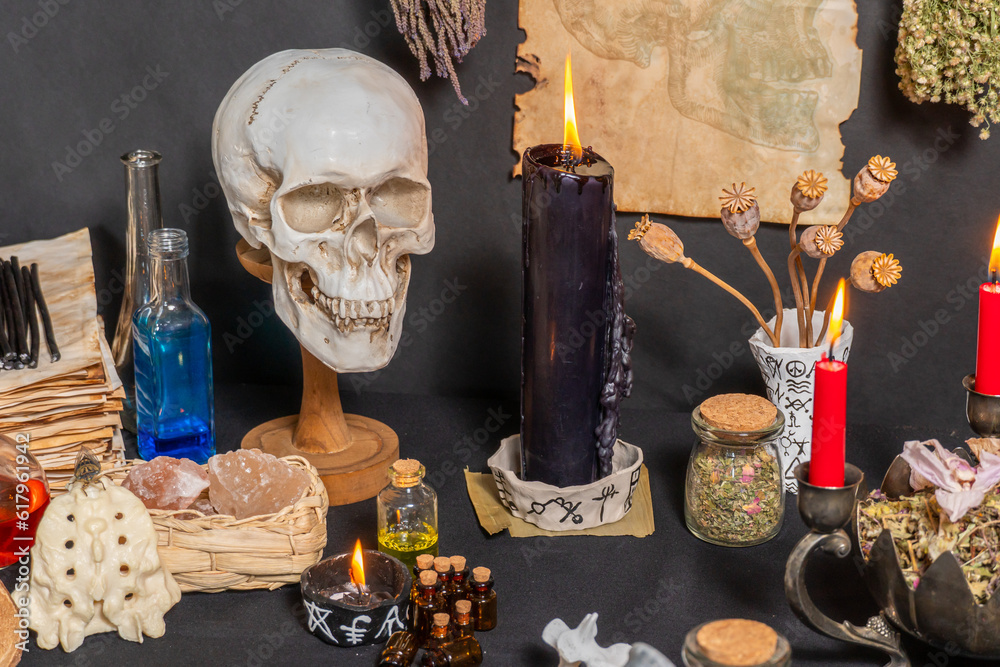Human skull witchcraft magic ritual. Black magic related objects and ...