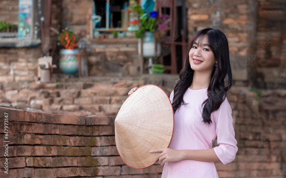 Beautiful woman with Vietnam culture traditional dress, Ao dai, in old ...