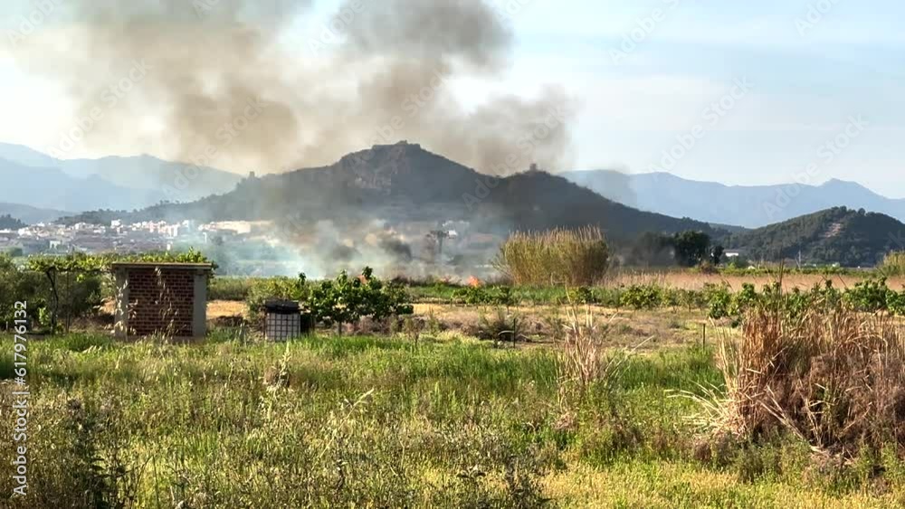 Vídeo do Stock: Fire on farm field. Fires in Spain due to drought. Hot ...