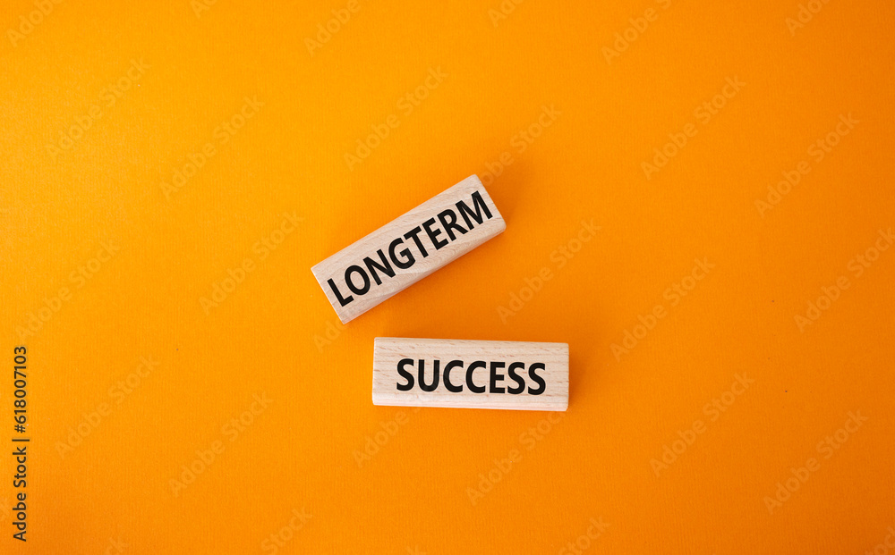 Longterm success symbol. Wooden blocks with words Longterm success ...