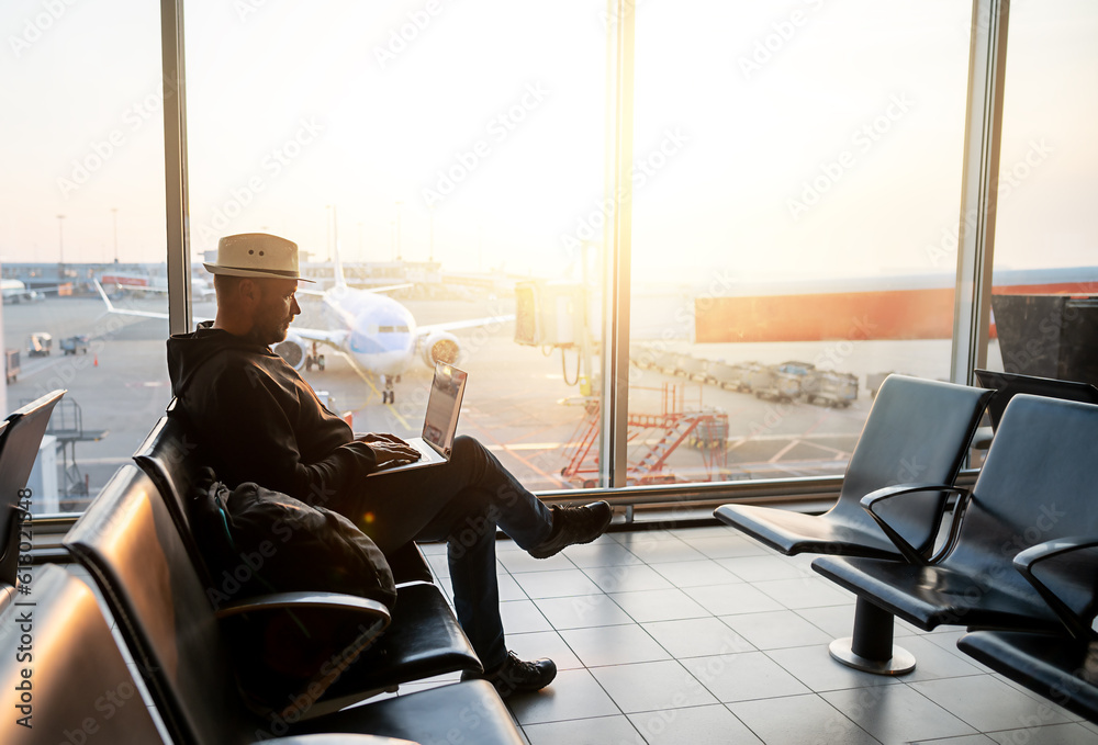 Airport Terminal: Businessman Uses Laptop Computer, Waiting for His ...