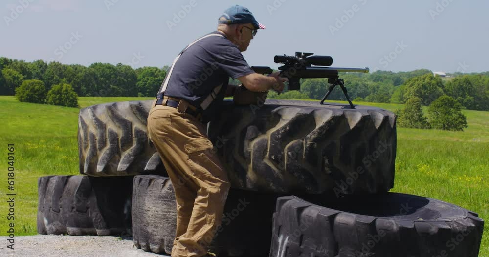 Marksman Positions Rifle At The Firing Point During Precision Rifle ...