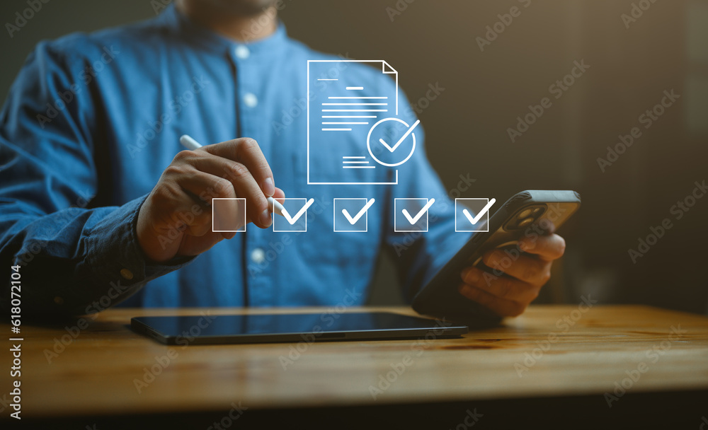 Check mark symbol represents the standard quality control. Businessman ...