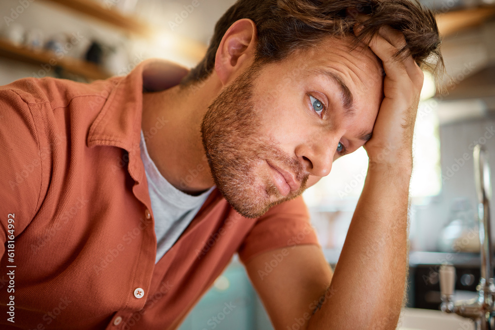 Tired, face and business man in kitchen for remote work, freelancer and ...