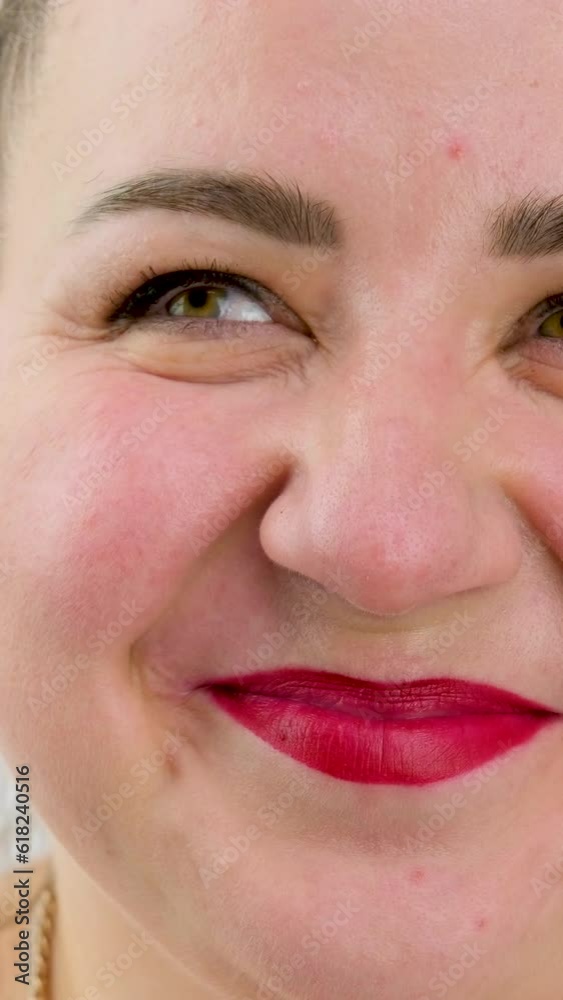 fat cheerful cute adult woman grimacing at the camera showing tongue ...