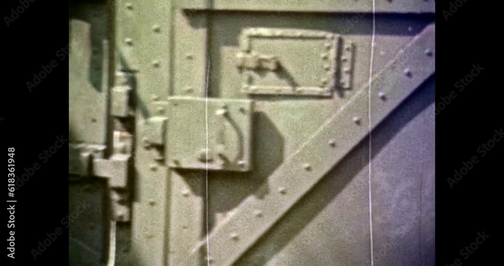 Iron prison door in brick jail building wall, close up. Big gate in ...
