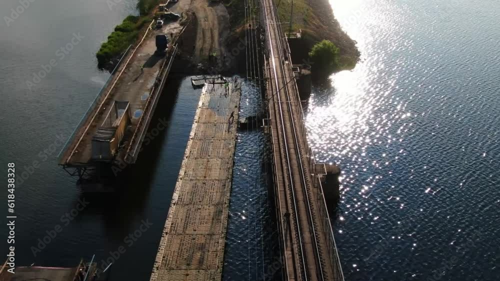 Pontoon bridge of the Ukrainian army. Installation of a temporary ...