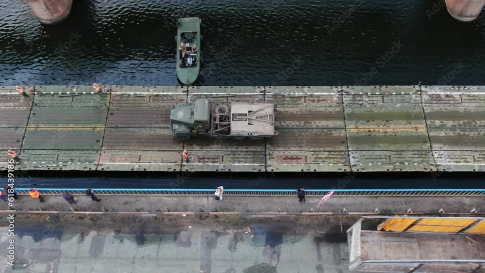 Pontoon bridge of the Ukrainian army. Installation of a temporary ...