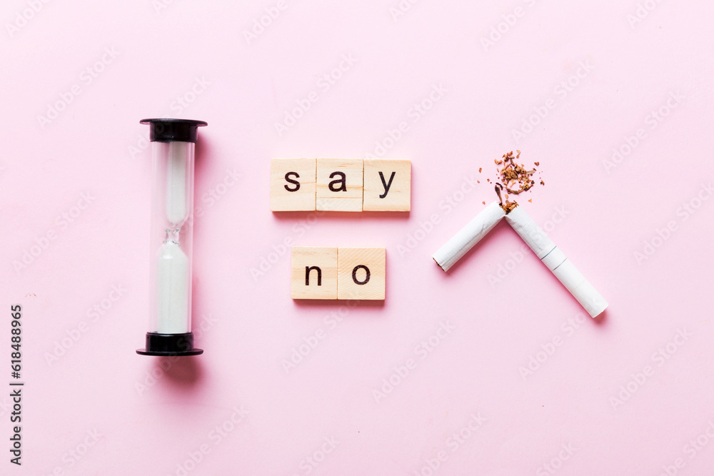 Cigarette And Wooden Blocks, Broken cigarette on table background with ...
