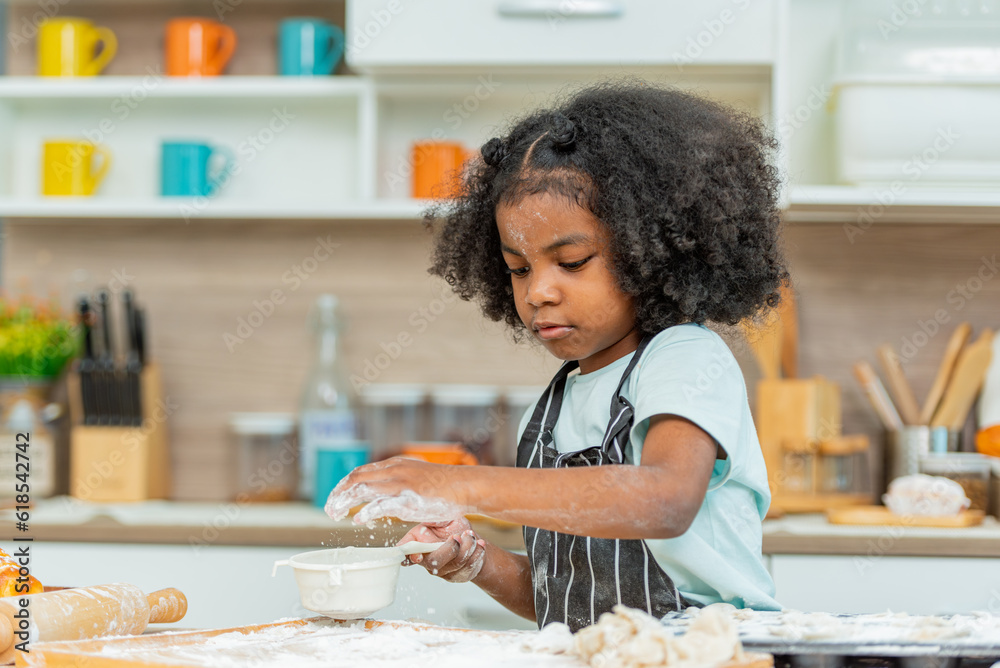 african afro black daughter kids sifting flour powder and sprinkling ...