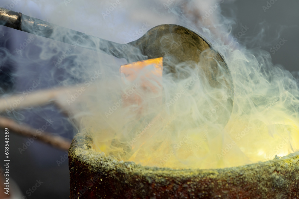Melted Aluminium Being Poured Into An Ingot