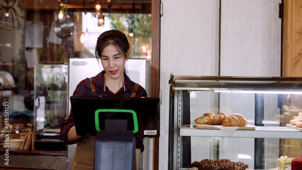Portrait owner cafe bakery standing behind counter inside shop, close ...