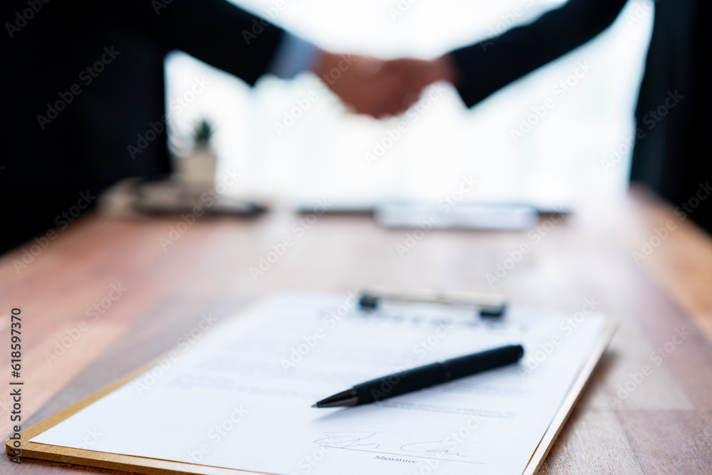 Focus table top view of contract document on meeting table with blur ...