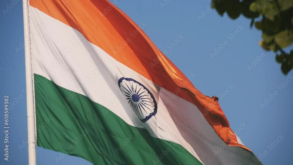 India flag flying high at Connaught Place with pride in blue sky, India ...