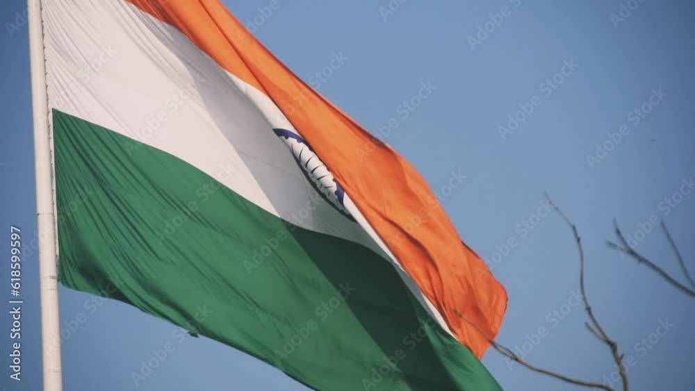 India flag flying high at Connaught Place with pride in blue sky, India ...