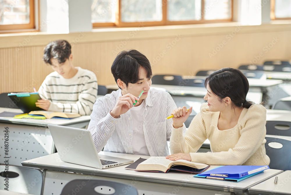 In a higher education classroom in South Korea, young university ...