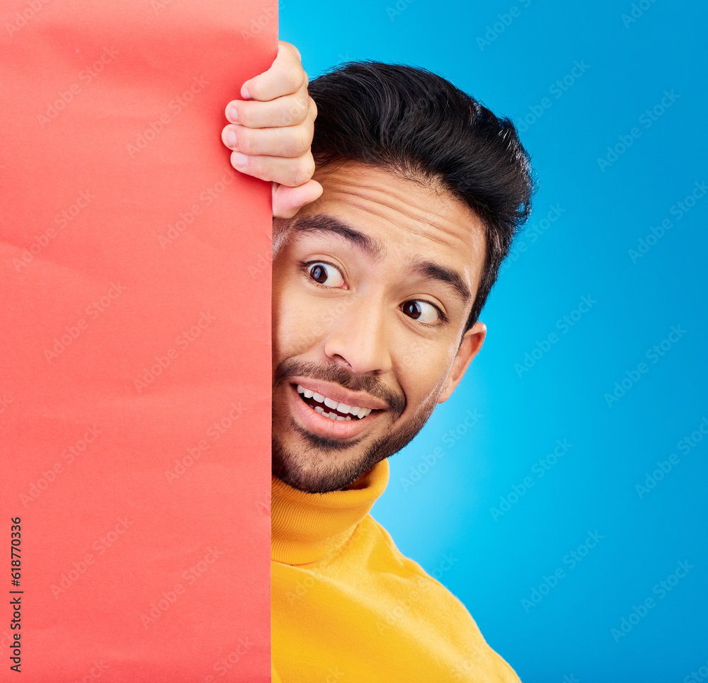 Surprise, peeking and young man in studio with a wow, omg or wtf facial ...