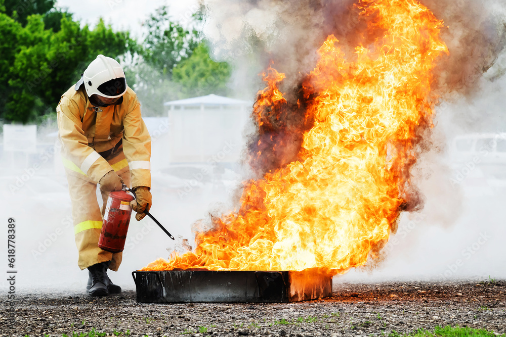 Fire fighting training. A firefighter passes an aptitude test ...