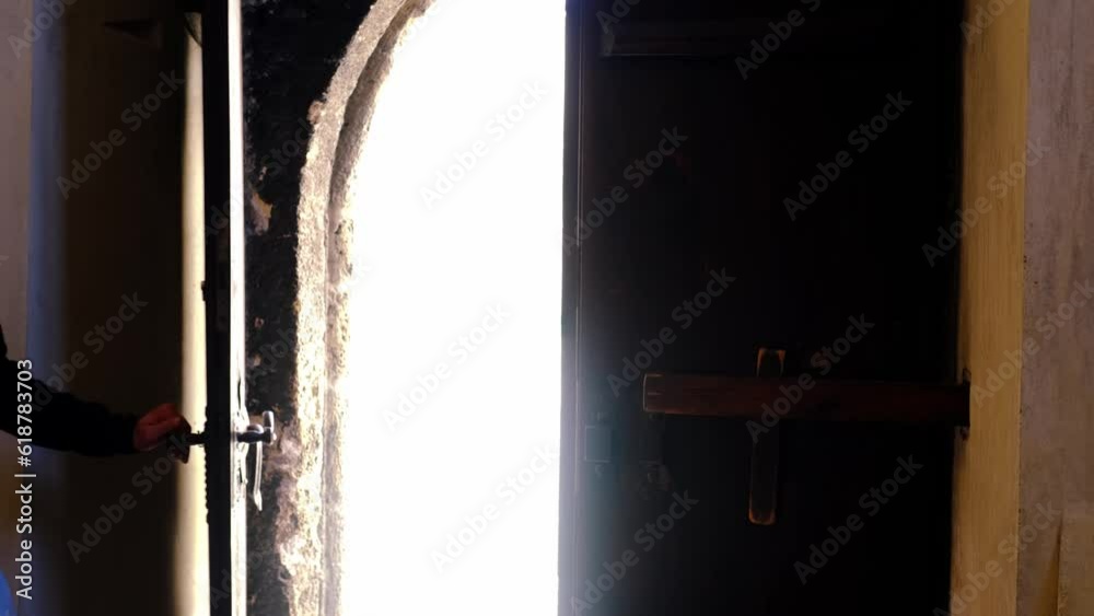 Video Stock old heavy wooden door mystically closes and opens by itself ...