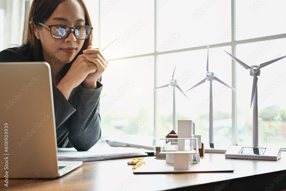 Models of energy-saving basic houses with blur backgrounds of ...