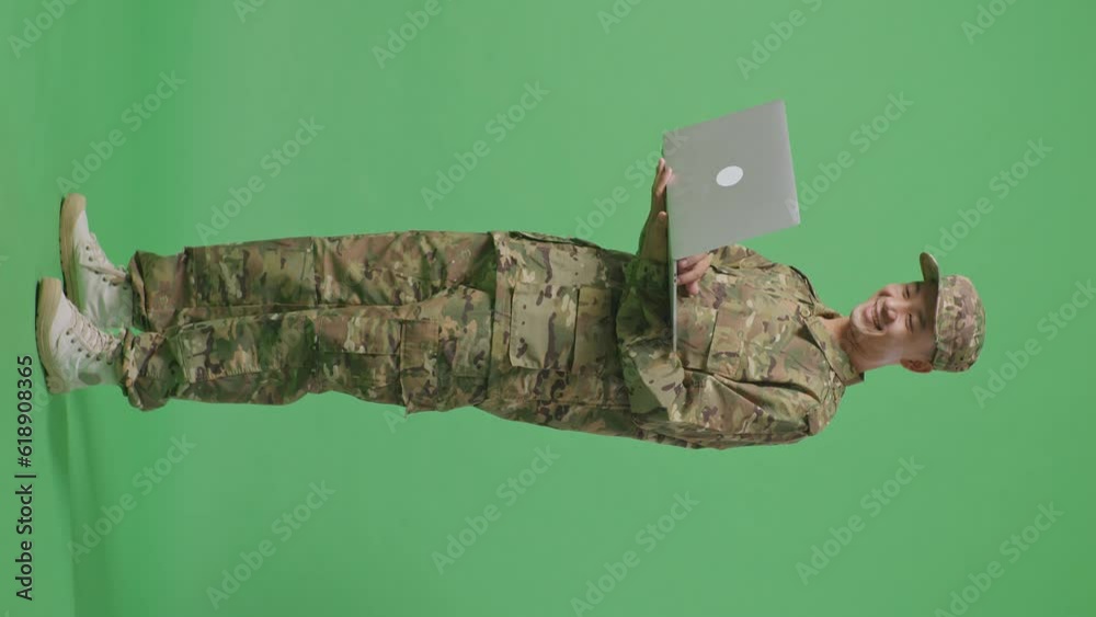 Full Body Of Side View Asian Man Soldier Using A Laptop While Standing ...