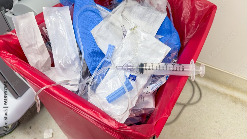 littered streets, discarded cigarette butts, plastic bags, and trash ...